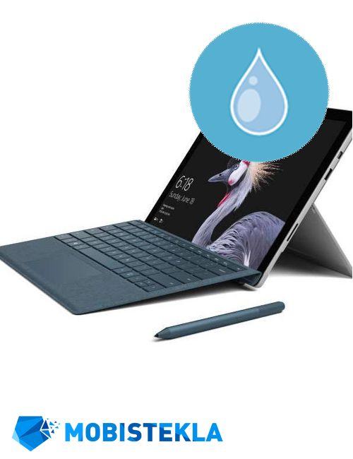 Microsoft Surface Pro 5 - stik s tekočino