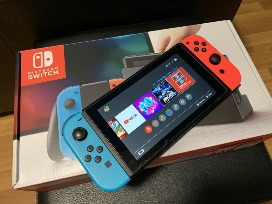 Nintendo Switch, kot nov, vsa oprema, embalaža + 64gb kartica + glass