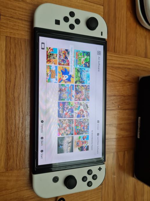 Nintendo Switch OLED ODKLENJEN ČIP igre 128GB MicroSD