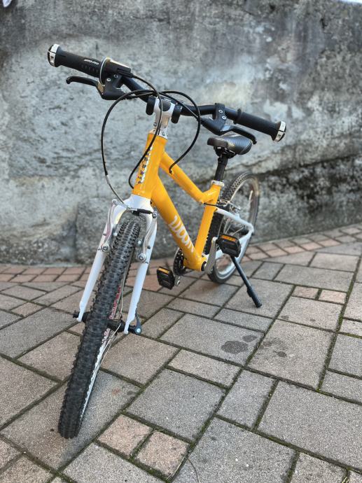 Woom 4 - otroško kolo 20 col rumeno + tačka
