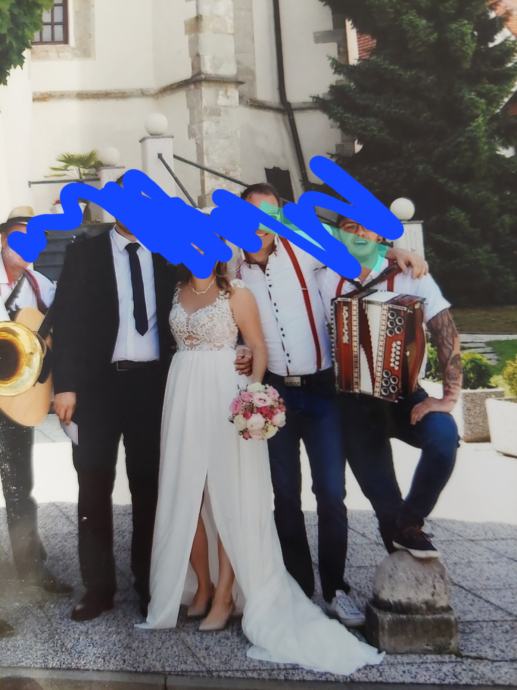 Buticna moderna porocna obleka