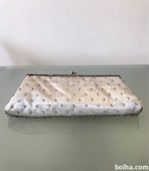 Srebrna clutch torbica