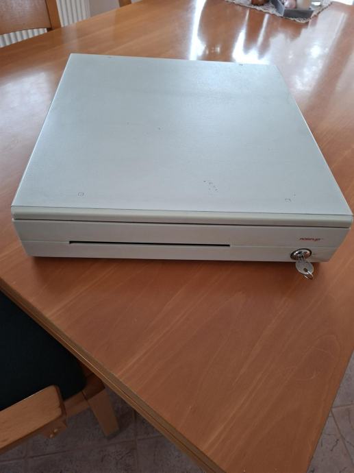 Blagajniški predal in mali printer za davčno blagajno