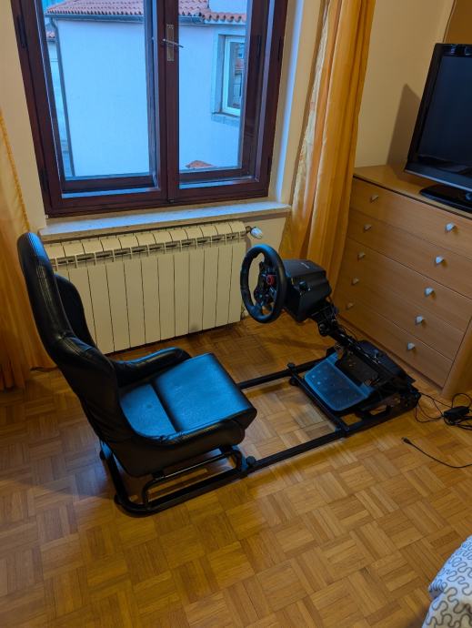 Racing simulator + volan Logitech g29 + PlayStation 4 slim + igre