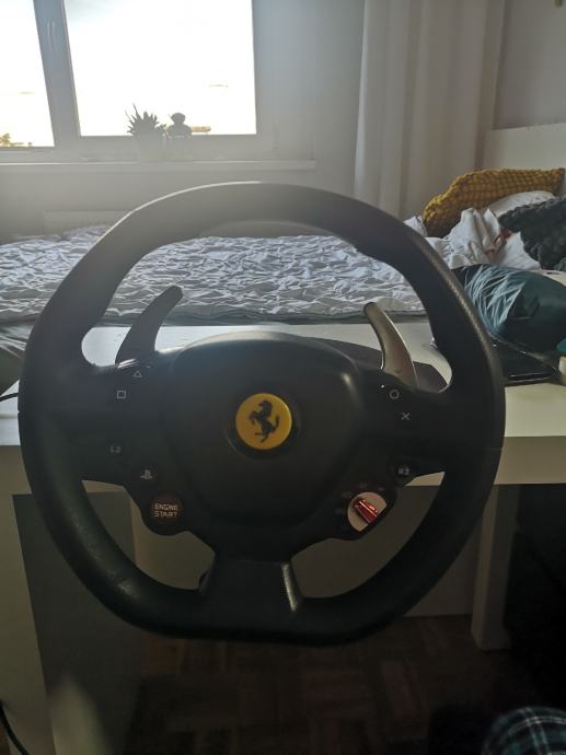 Volan Thrustmaster T80 in pedala + 2 PS4 videoigri (F1 2017, Dirt 4)