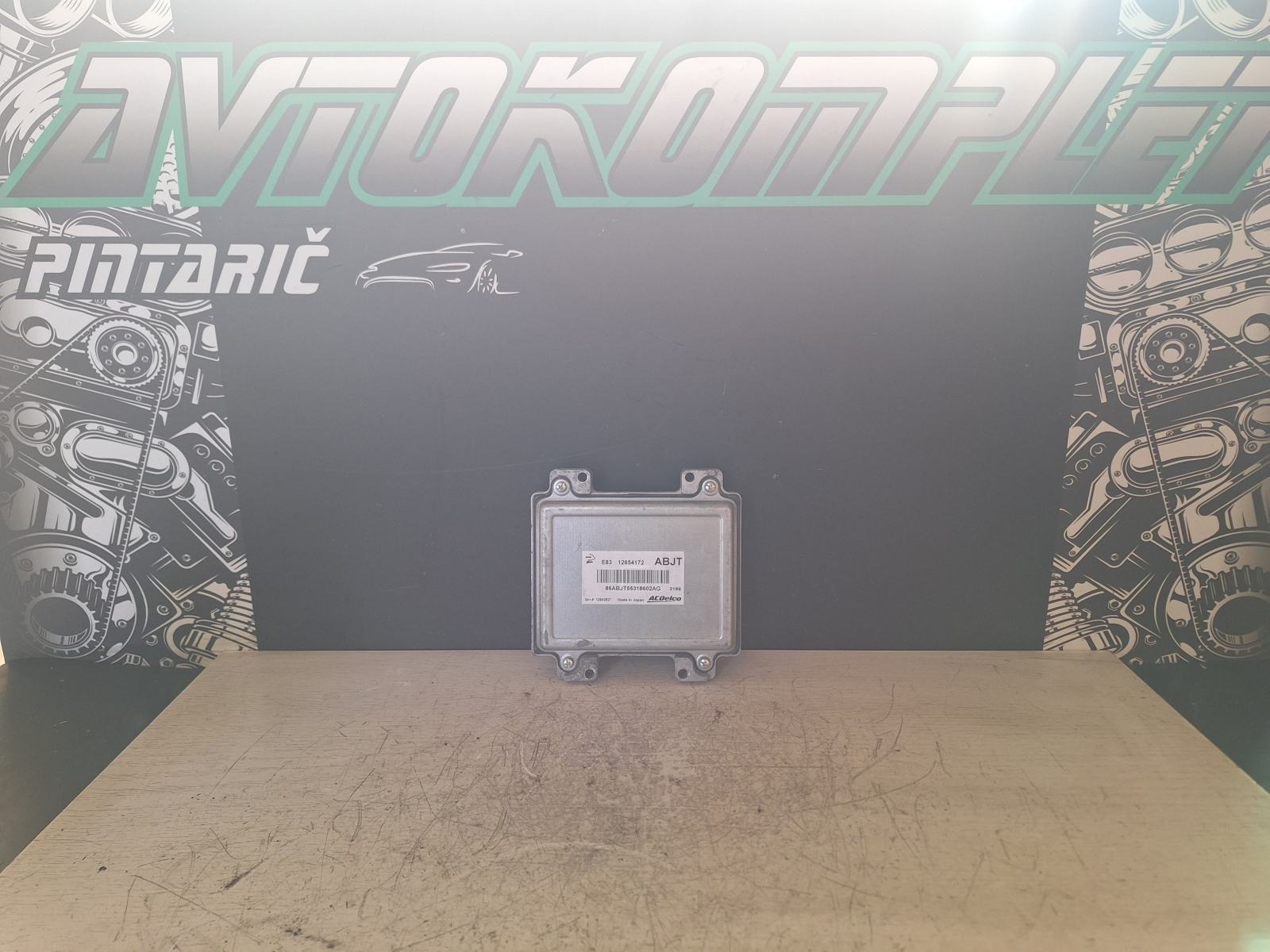 Opel Astra J ecu motorni računalnik E8312654172