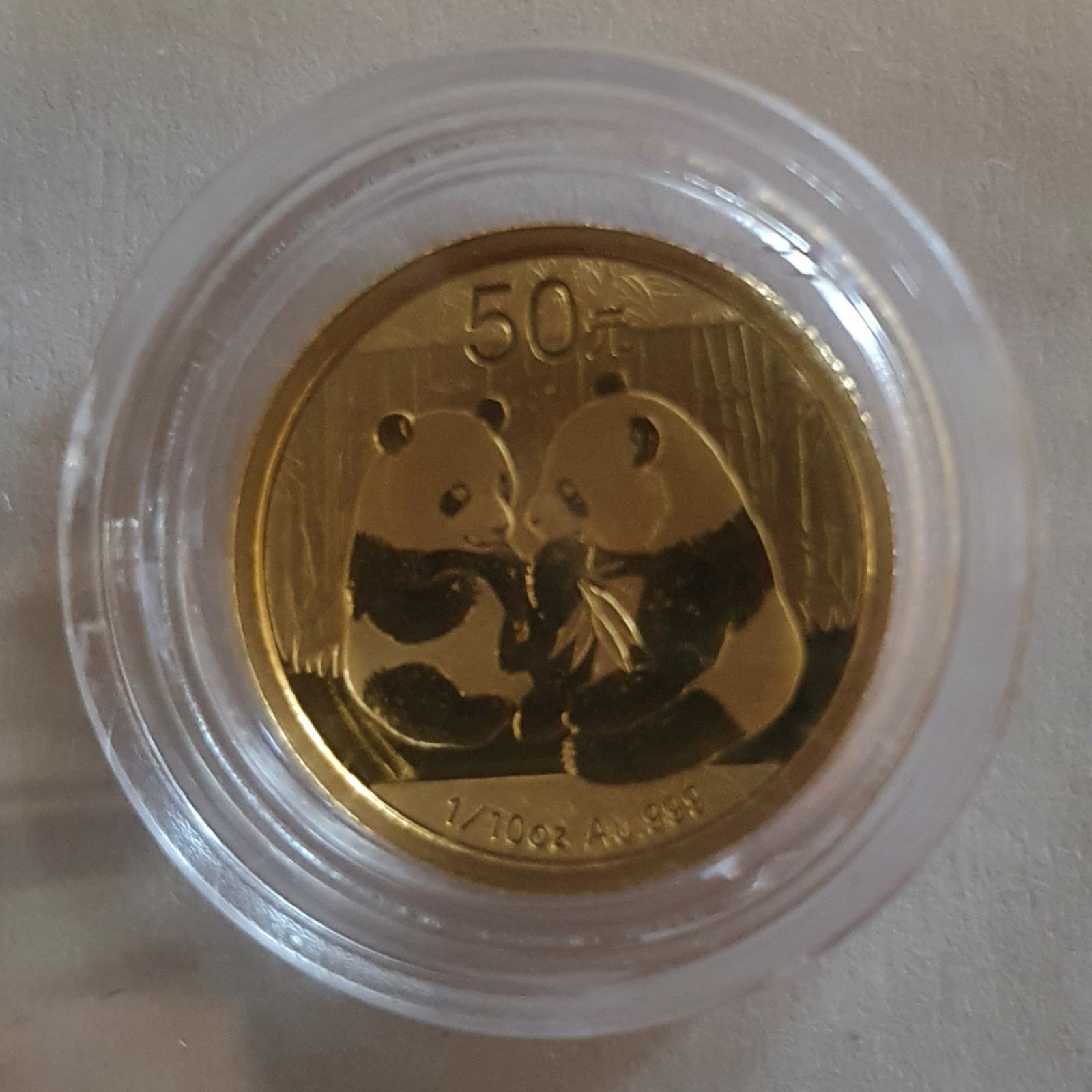 Zlatnik, zlati naložbeni kovanec, Kitajska panda 2009, 1/10 OZ