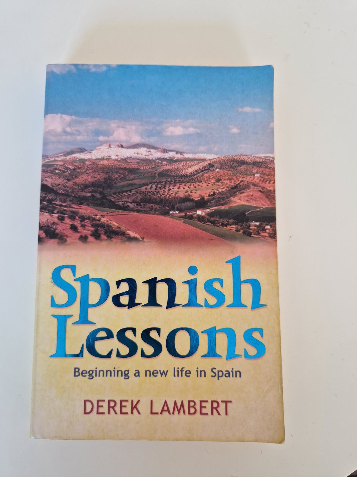 Knjiga Spanish Lessons (Derek Lambert), v angleščini