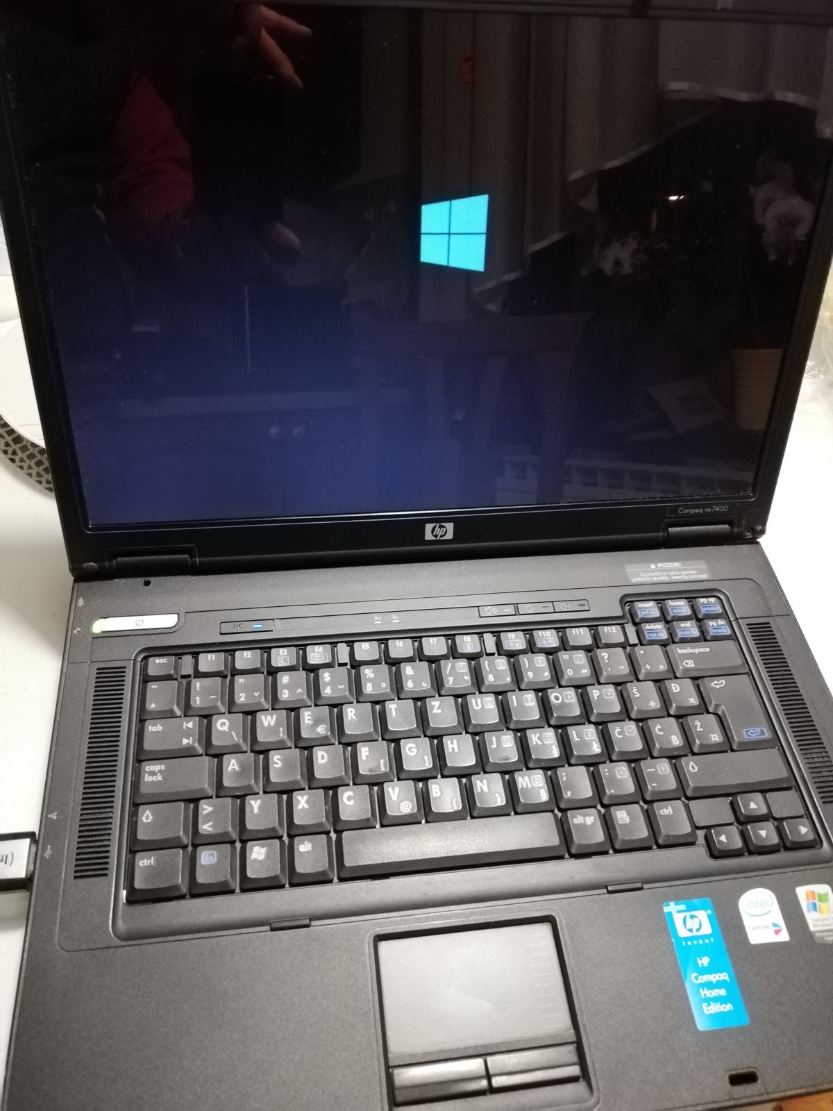Prenosnik HP Compaq nx7400, docking station, dodatni napajalec, torba