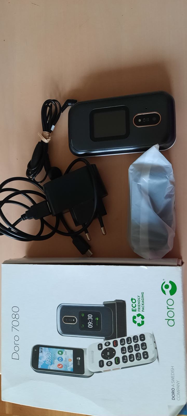 Nov telefon DORO 7080 prodam