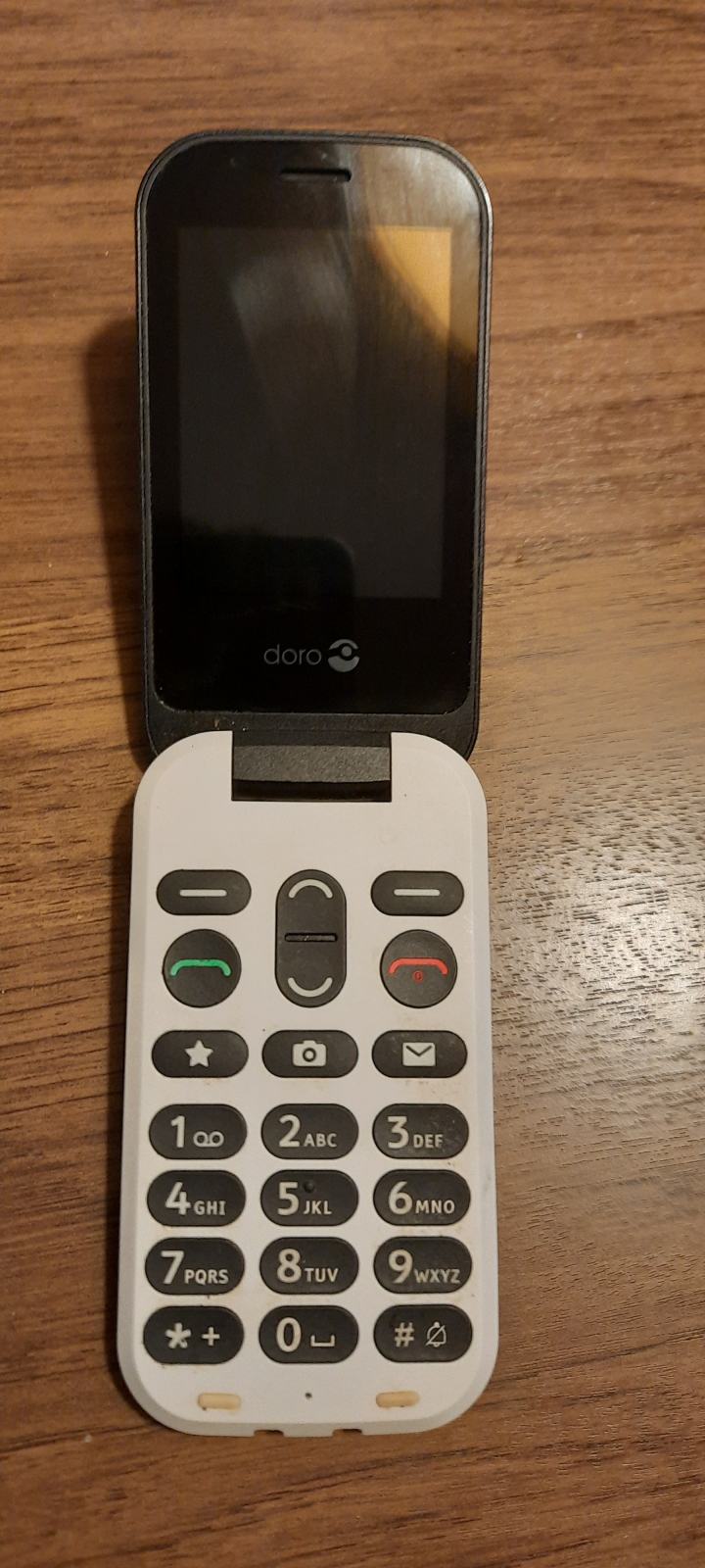 Nov telefon DORO 7080 prodam