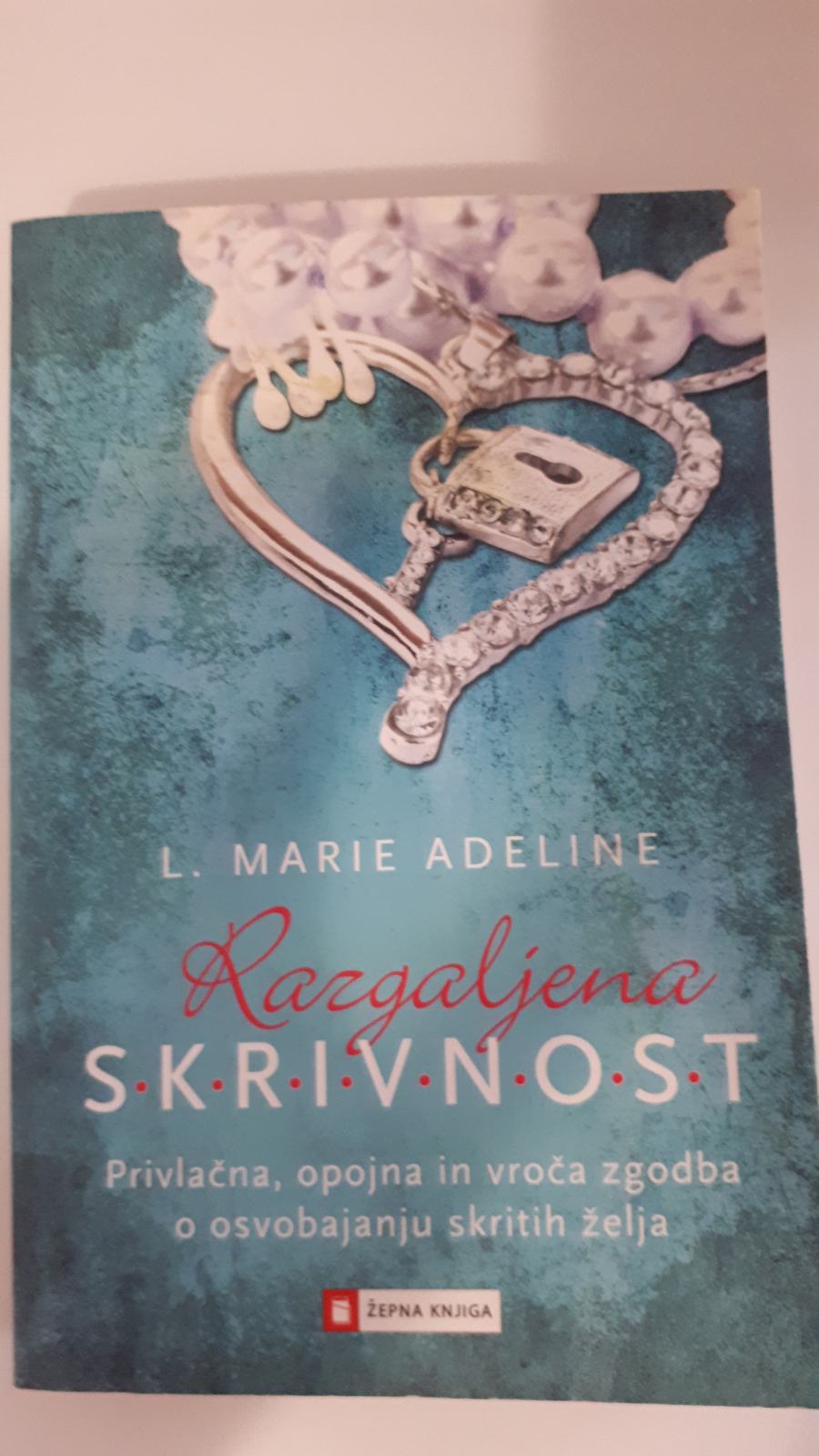 Knjiga Razgaljena skrivnost - L. Marie Adeline