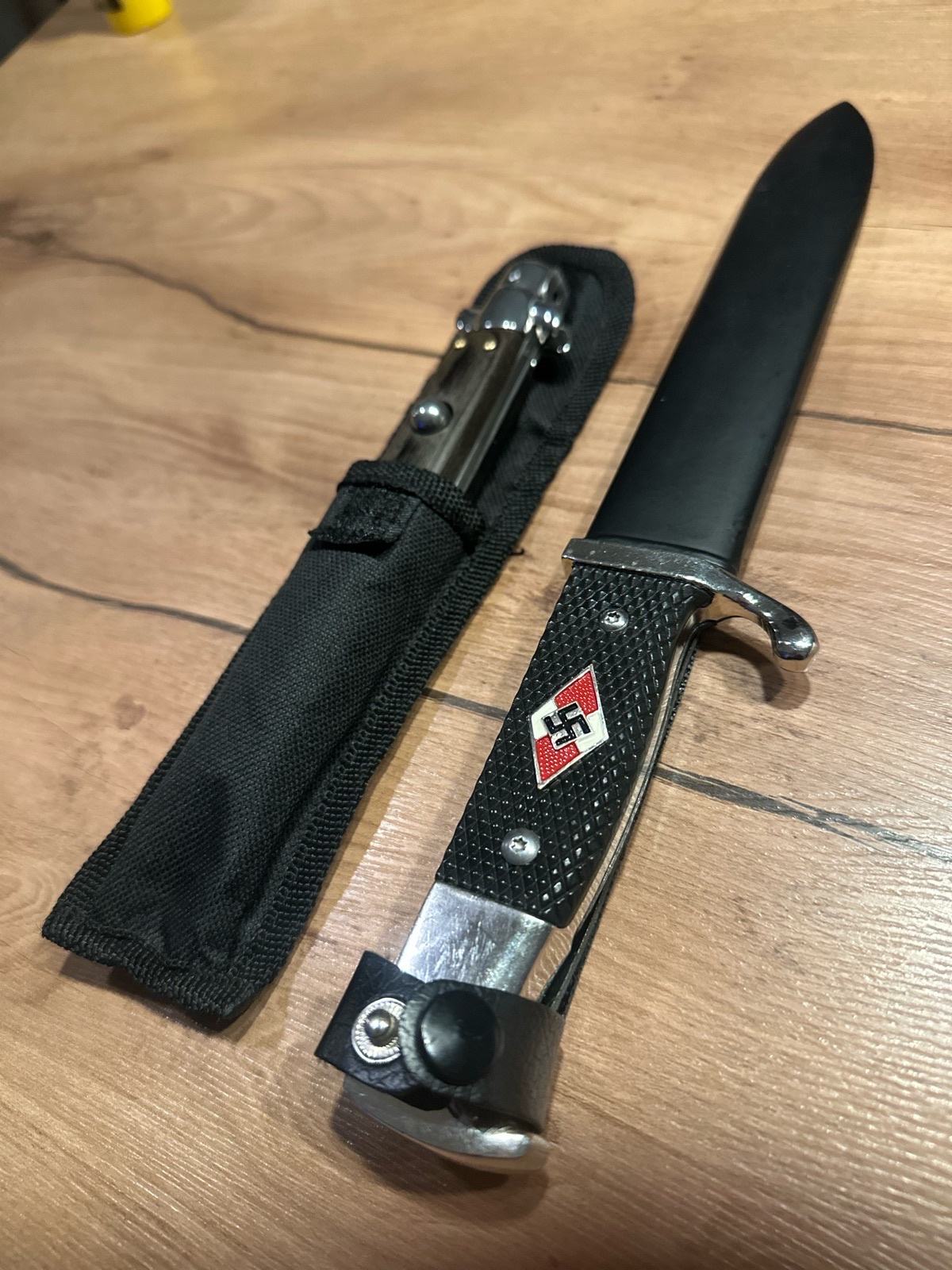Combat knife and a pocket knife