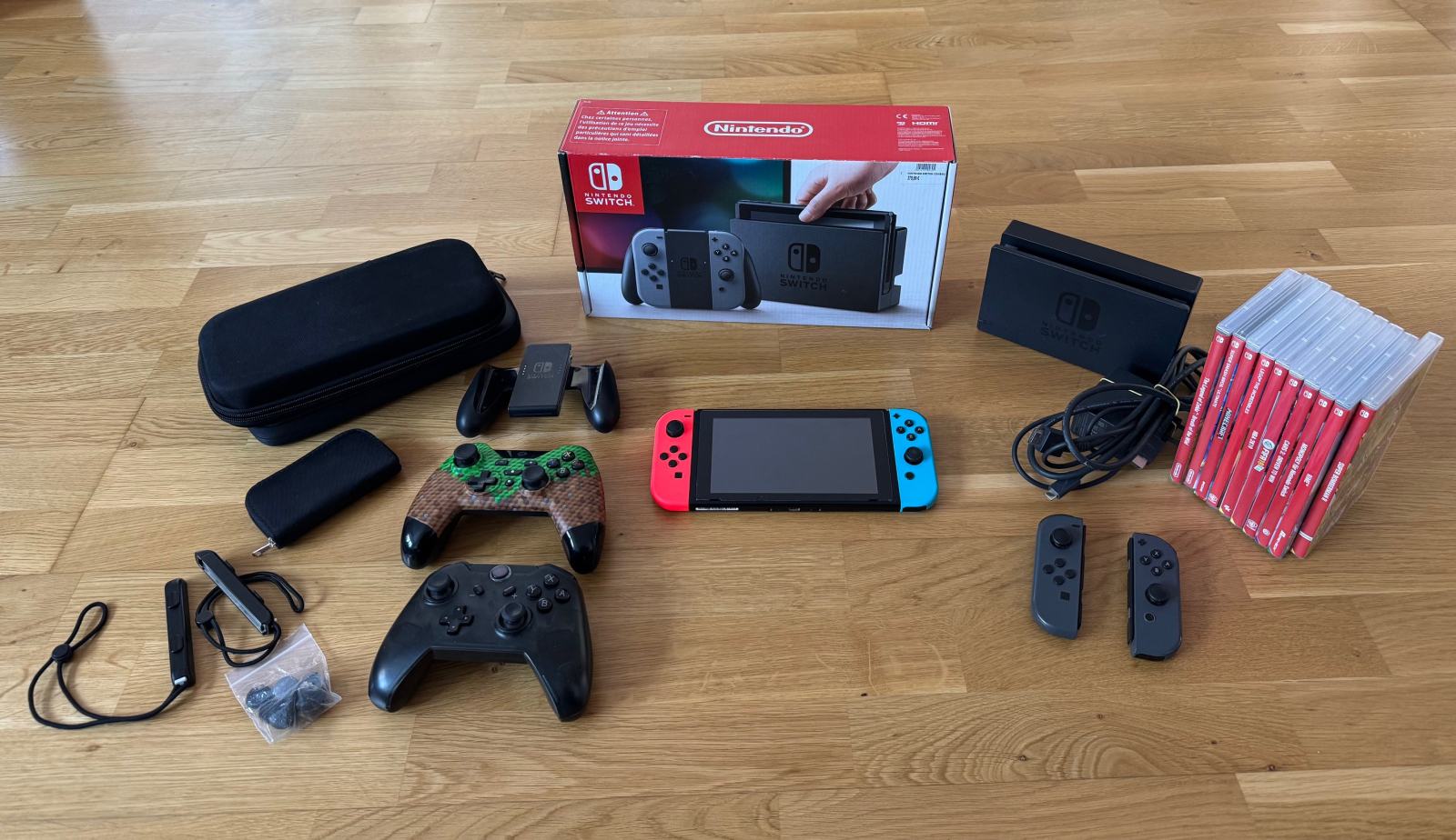 Nintendo Switch z veliko opreme in desetimi igrami - 250 EUR