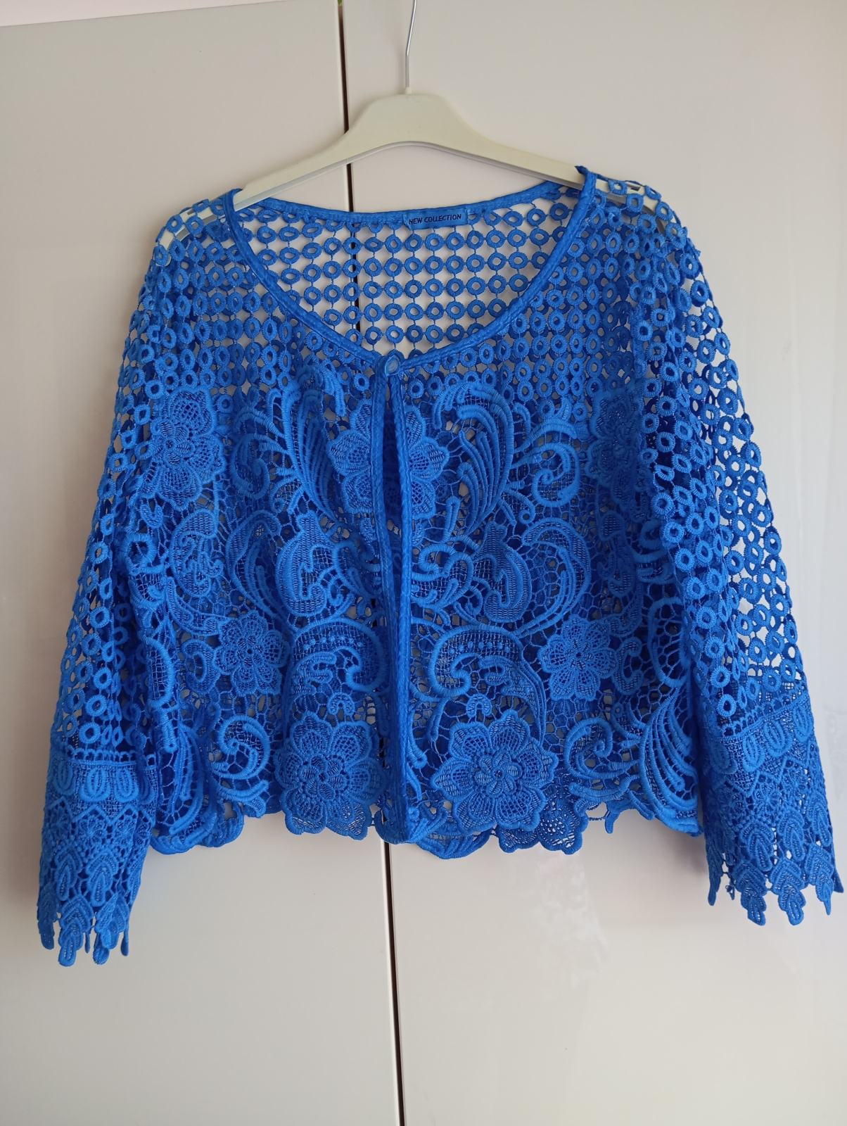 NOV MODER ČIPKAST BOLERO 42/44