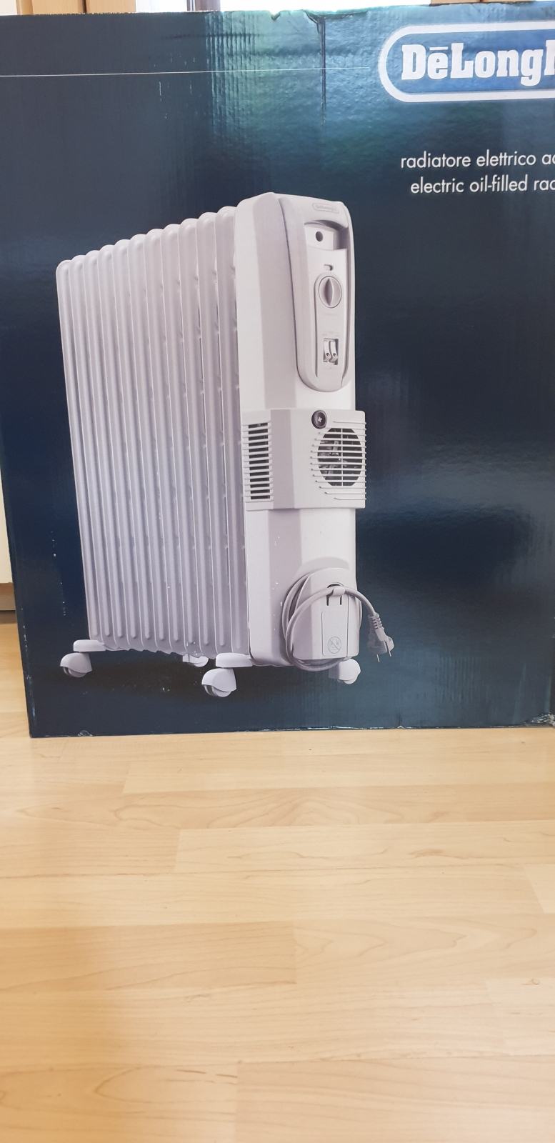 oljni radiator delonghi.