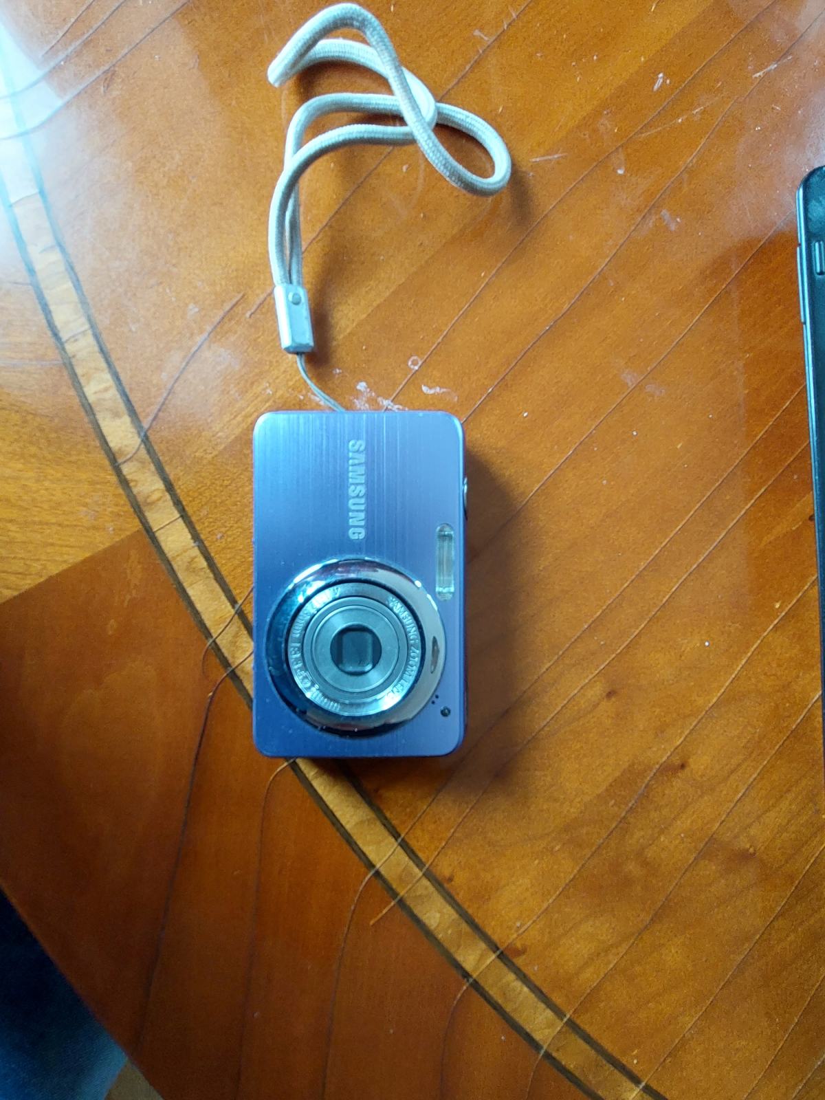 samsung ST30, polnilec