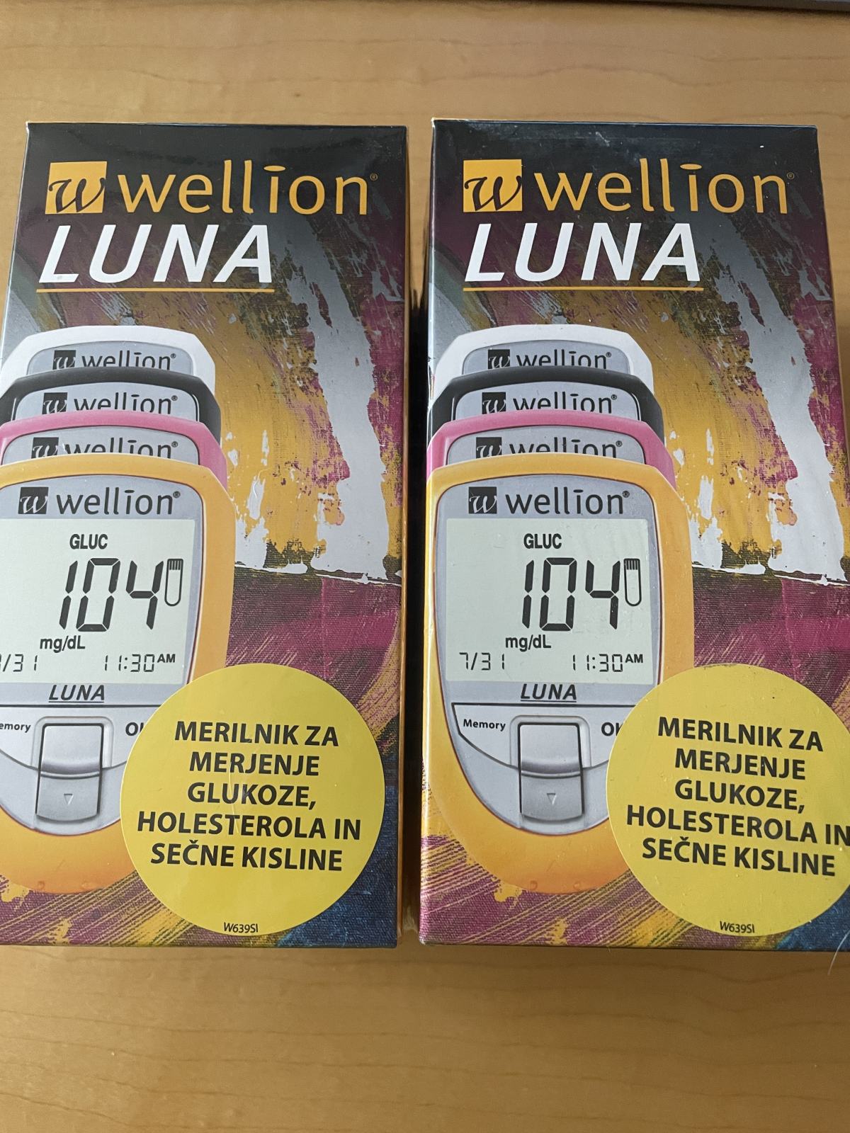2X MERILNIK WELLION LUNA ZA MERJENJE GLUKOZE, HOLESTEROLA IN SEČNE KIS