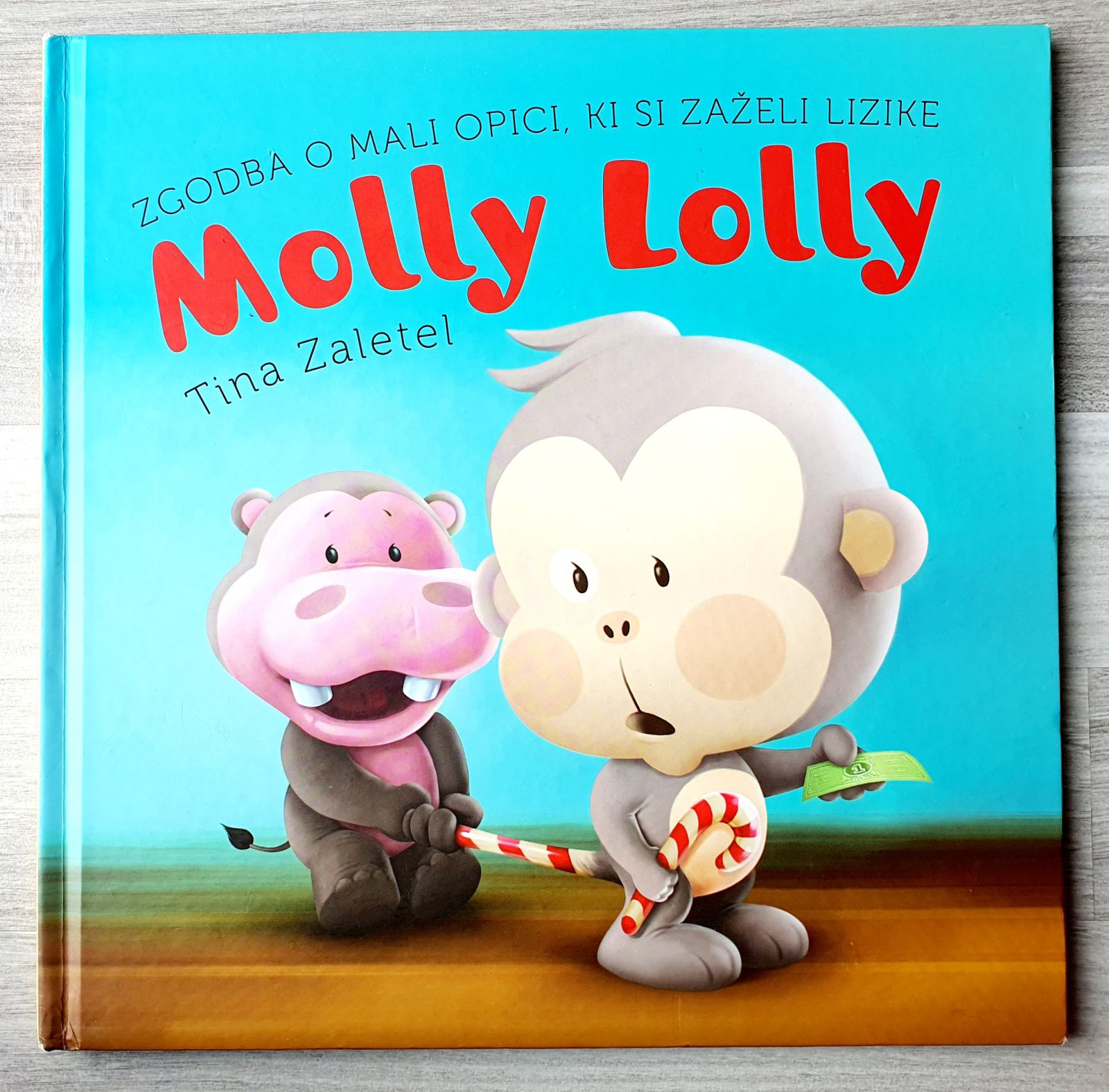 MOLLY LOLLY : ZGODBA O MALI OPICI, KI SI ZAŽELI LIZIKE Tina Zaletel