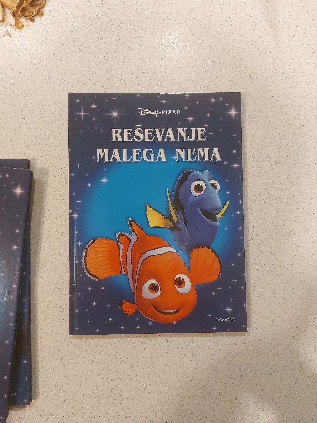 Otroška knjiga REŠEVANJE MALEGA NEMA DISNEY