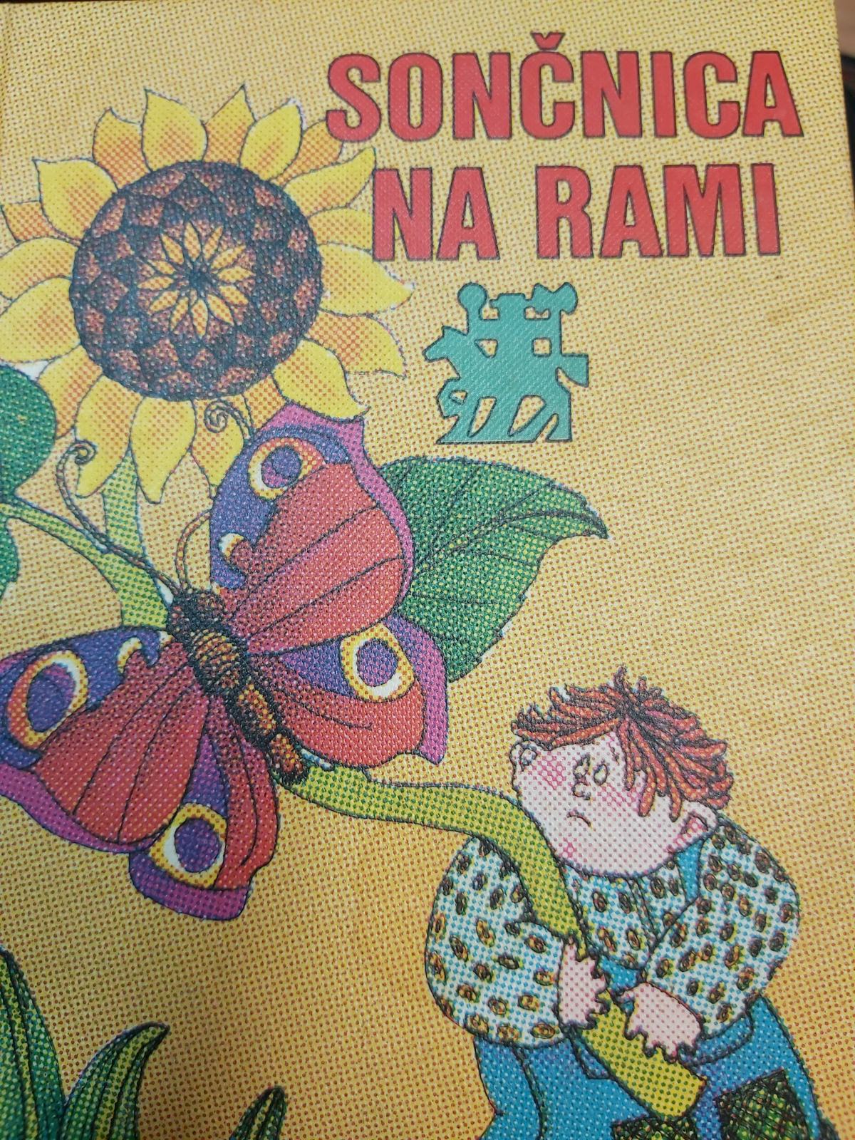 ZLATA KNJIGA SONČNICA NA RAMI