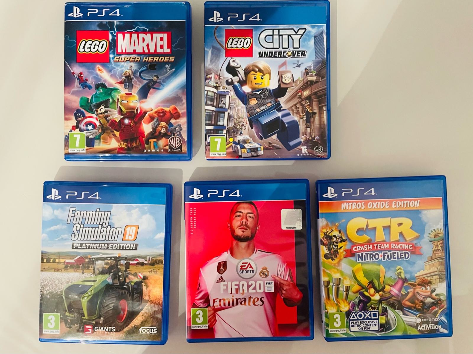 Različne igre za PS4 (Fifa, Farming, Lego Marvel, Lego City, CTR)