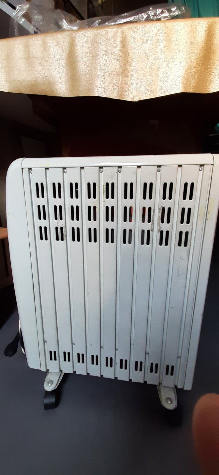 Oljni radiator Midea