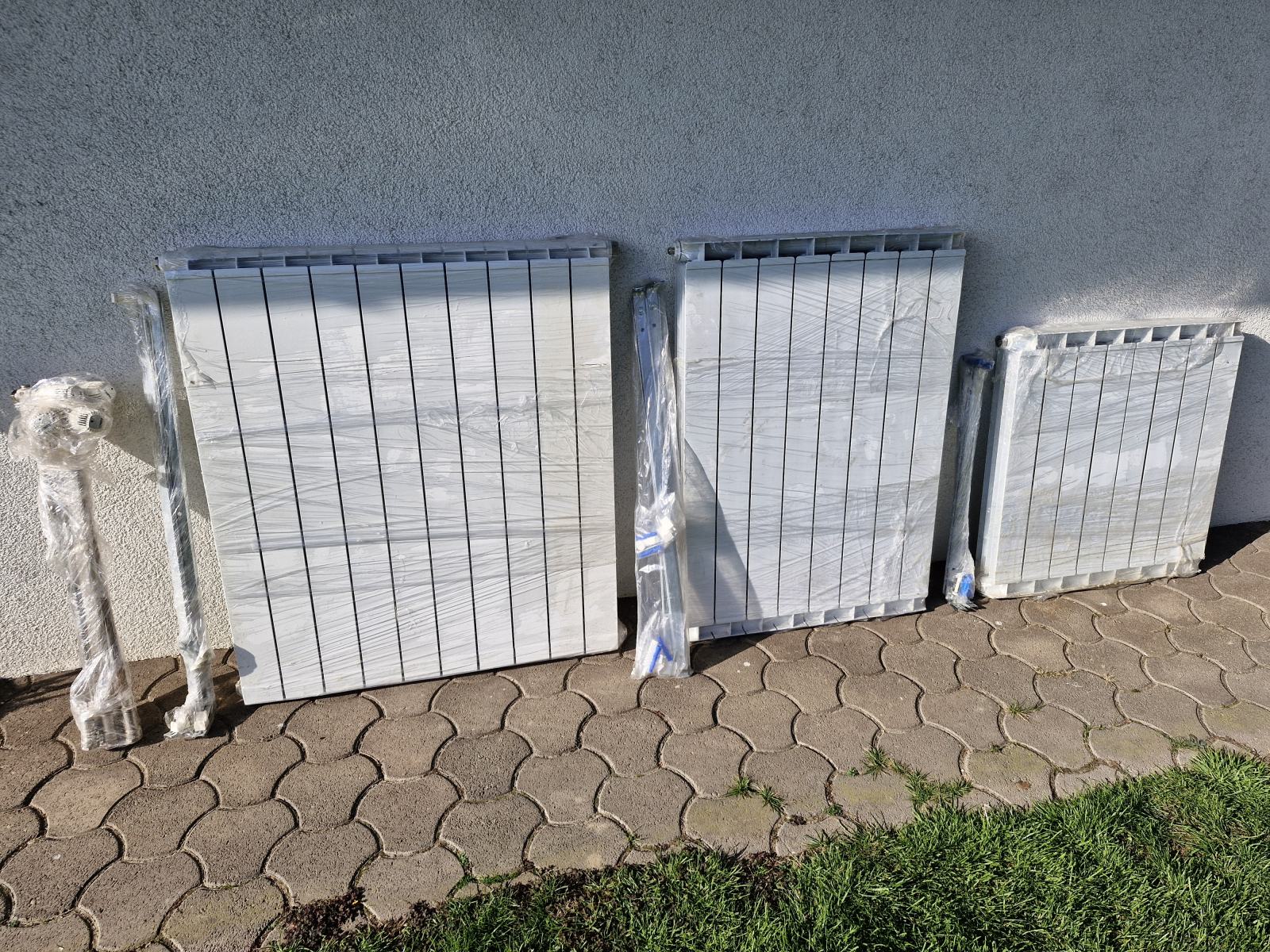 Radiatorji aluminijasti Aklimat konzole ventili termostatske glave