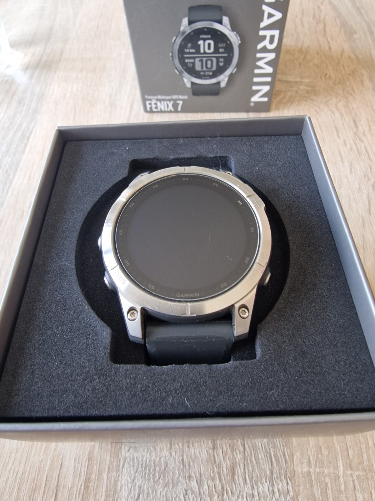 Športna ura Garmin fenix 7 silver/grey.