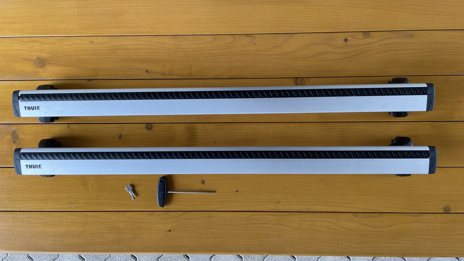 Thule wing bar + noge za Passat variant