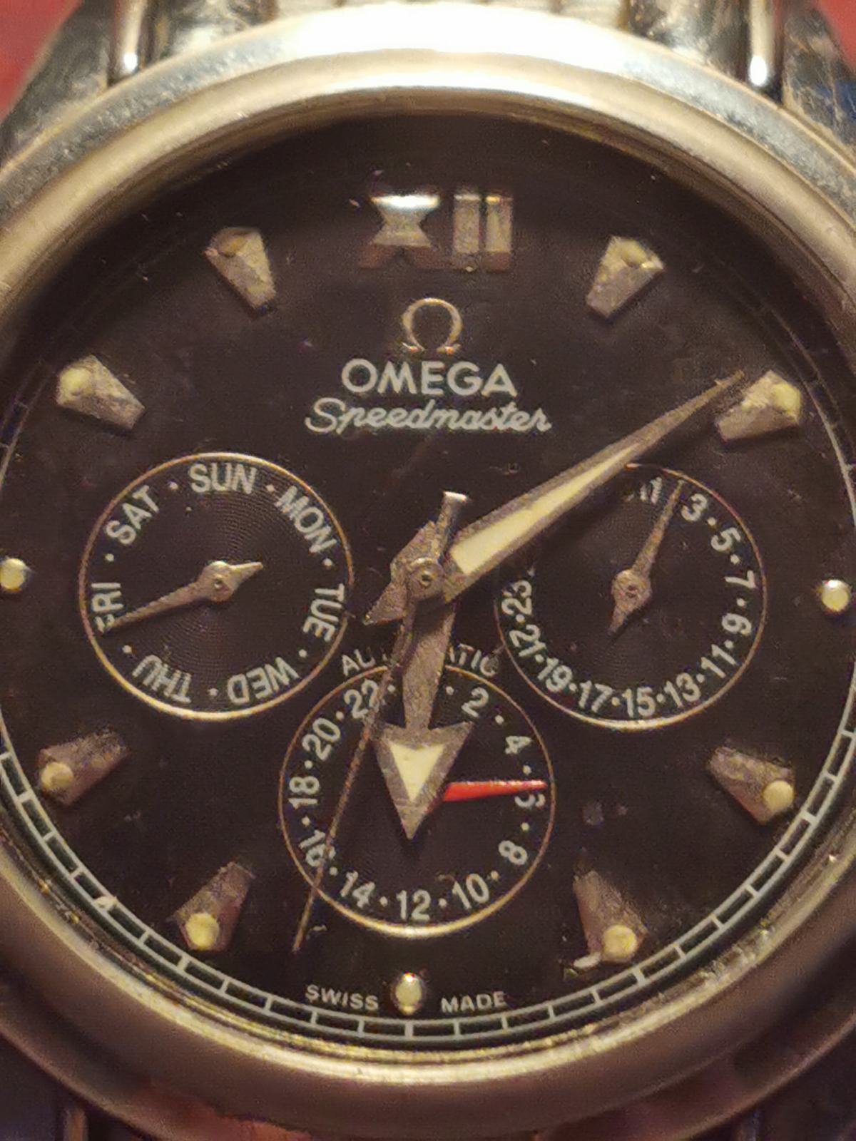 ura Omega speedmaster automatic co escapement 999/655