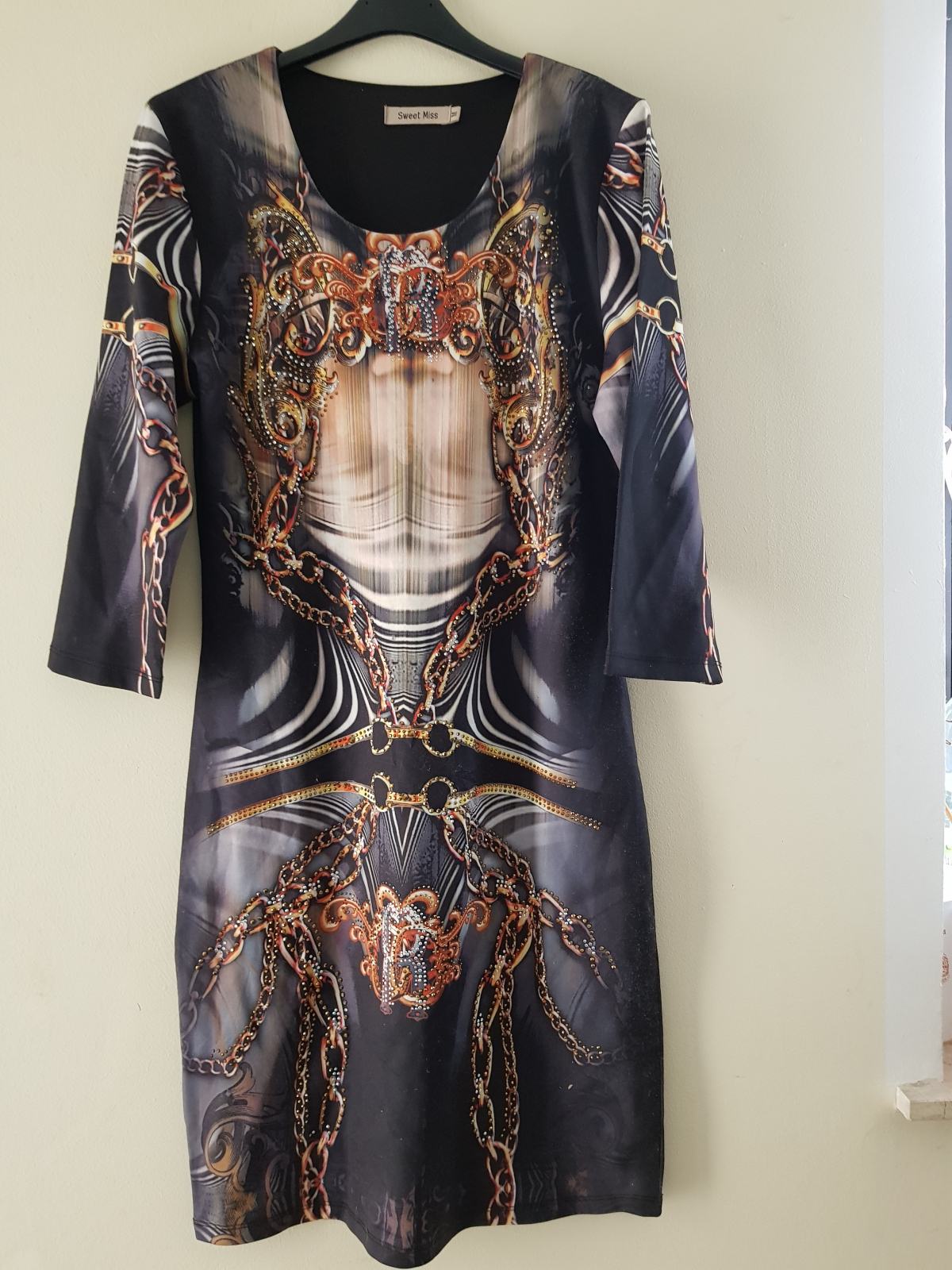 SWET MISS NOVA SVEČANA SVETLEČA OBLEKA 38/40